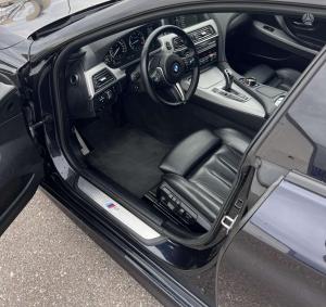 Black BMW 640 Gran Coupe 2013 in Kaunas, with an engine capacity of 3.00 L and mileage of 313 thousand km for 13990 €, photo 7 on AUTOMOTO.COM.LV