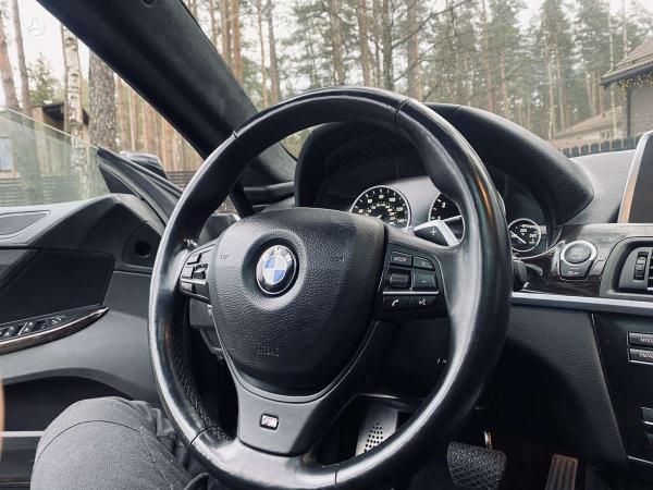 Black BMW 640 Gran Coupe 2013 in Vilnius, with an engine capacity of 3.00 L and mileage of 280 thousand km for 13900 €, photo 11 on AUTOMOTO.COM.LV