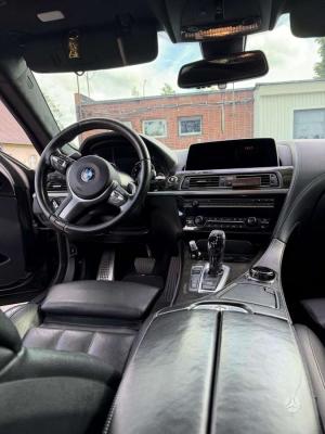 Black BMW 640 Gran Coupe 2017 in Vilnius, with an engine capacity of 3.00 L and mileage of 200 thousand km for 19600 €, photo 20 on AUTOMOTO.COM.LV