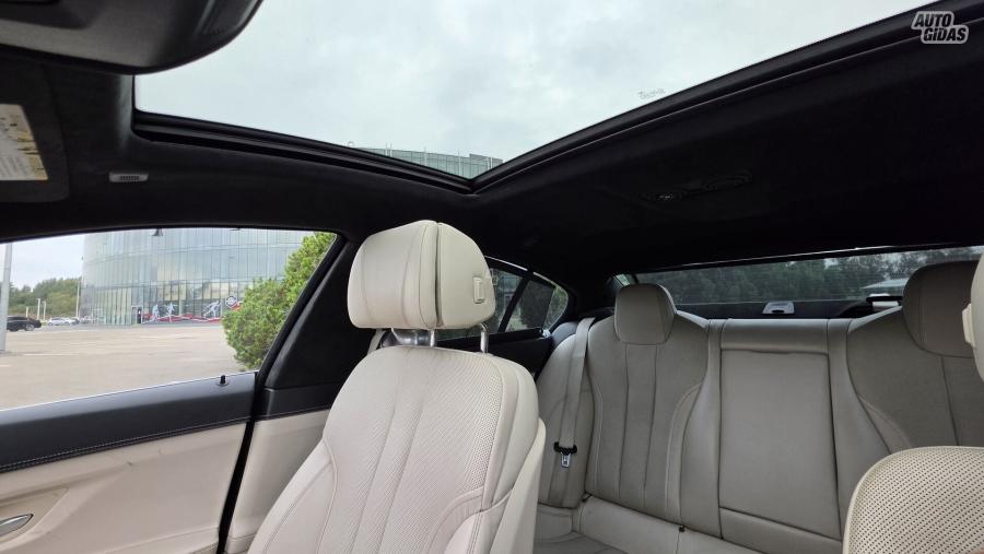 Blue BMW 640 Gran Coupe 2013 in Siauliai, with an engine capacity of 3.00 L and mileage of 187 thousand km for 14999 €, photo 18 on AUTOMOTO.COM.LV