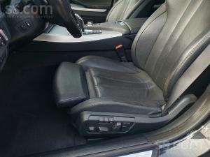 Black BMW 650 2013 in Riga, with an engine capacity of 4.40 L and mileage of 215 thousand km for 9650 €, photo 15 on AUTOMOTO.COM.LV