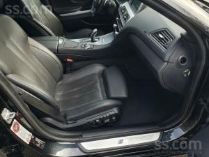 Black BMW 650 2013 in Riga, with an engine capacity of 4.40 L and mileage of 215 thousand km for 9650 €, photo 18 on AUTOMOTO.COM.LV