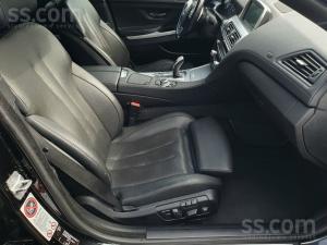 Black BMW 650 2013 in Riga, with an engine capacity of 4.40 L and mileage of 215 thousand km for 9650 €, photo 19 on AUTOMOTO.COM.LV