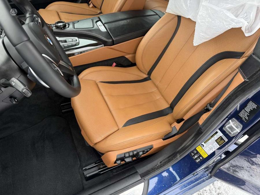 Blue BMW 650 2016 in Marijampole, with an engine capacity of 4.40 L and mileage of 116 thousand km for 22000 €, photo 12 on AUTOMOTO.COM.LV