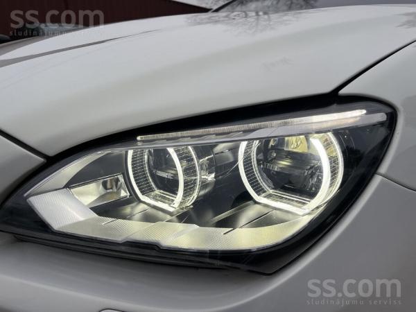White BMW 650 2013 in Riga, with an engine capacity of 4.40 L and mileage of 0 thousand km for 15990 €, photo 8 on AUTOMOTO.COM.LV