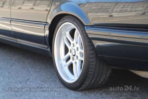 Black BMW 7 Series 1993 in Tallinn, with an engine capacity of 3.00 L and mileage of 444 thousand km for 10900 €, photo 11 on AUTOMOTO.COM.LV