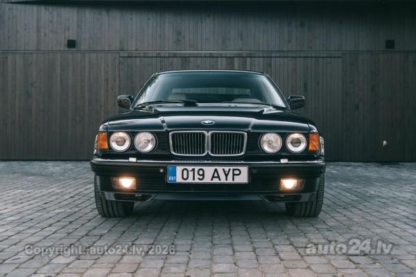 Black BMW 7 Series 1994 in Tallinn, with an engine capacity of 5.00 L and mileage of 217 thousand km for 13499 €, photo 2 on AUTOMOTO.COM.LV