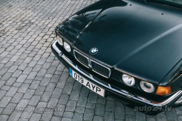 Black BMW 7 Series 1994 in Tallinn, with an engine capacity of 5.00 L and mileage of 217 thousand km for 13499 €, photo 6 on AUTOMOTO.COM.LV