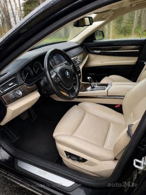Black BMW 7 Series 2009 in Tallinn, with an engine capacity of 3.00 L and mileage of 302 thousand km for 9000 €, photo 5 on AUTOMOTO.COM.LV