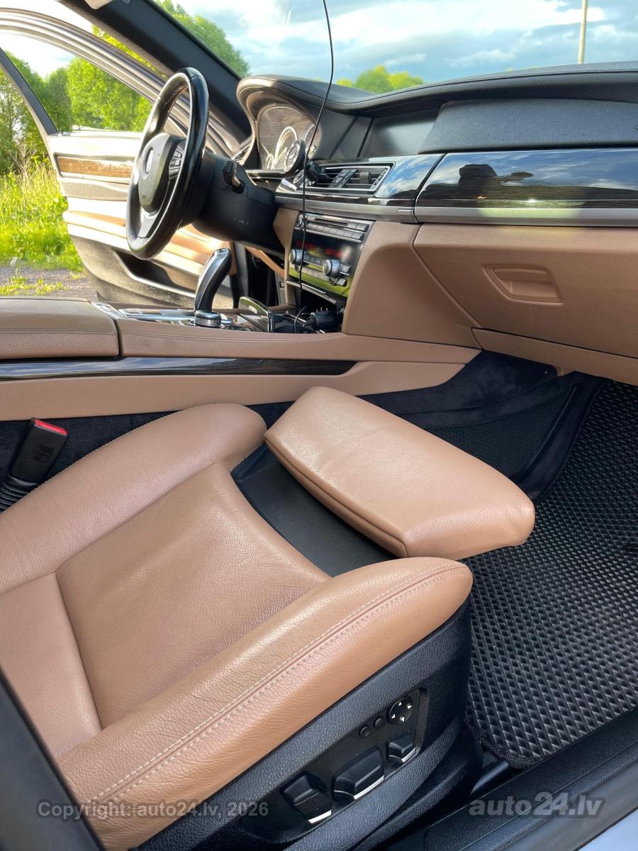 Black BMW 7 Series 2009 in Tallinn, with an engine capacity of 3.00 L and mileage of 416 thousand km for 7800 €, photo 10 on AUTOMOTO.COM.LV