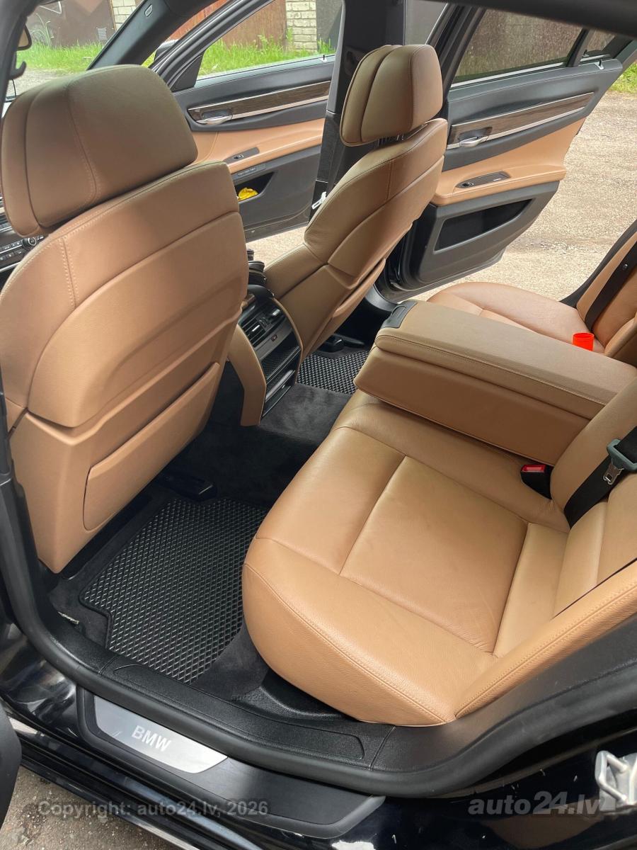 Black BMW 7 Series 2009 in Tallinn, with an engine capacity of 3.00 L and mileage of 416 thousand km for 7800 €, photo 14 on AUTOMOTO.COM.LV