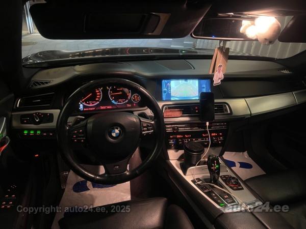 Black BMW 7 Series 2010 in Tallinn, with an engine capacity of 3.00 L and mileage of 309 thousand km for 13500 €, photo 11 on AUTOMOTO.COM.LV