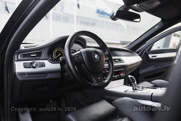 Black BMW 7 Series 2010 in Tallinn, with an engine capacity of 3.00 L and mileage of 392 thousand km for 8000 €, photo 6 on AUTOMOTO.COM.LV