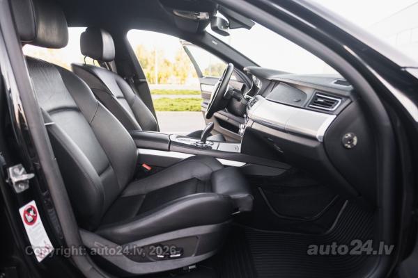 Black BMW 7 Series 2010 in Tallinn, with an engine capacity of 3.00 L and mileage of 392 thousand km for 8000 €, photo 10 on AUTOMOTO.COM.LV