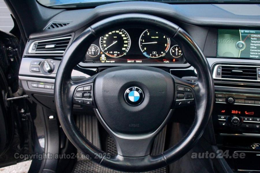 Black BMW 7 Series 2011 in Tallinn, with an engine capacity of 3.00 L and mileage of 310 thousand km for 14999 €, photo 13 on AUTOMOTO.COM.LV