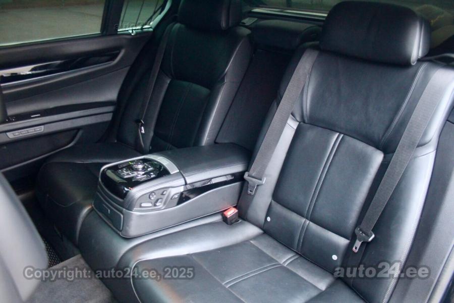 Black BMW 7 Series 2011 in Tallinn, with an engine capacity of 3.00 L and mileage of 310 thousand km for 14999 €, photo 18 on AUTOMOTO.COM.LV