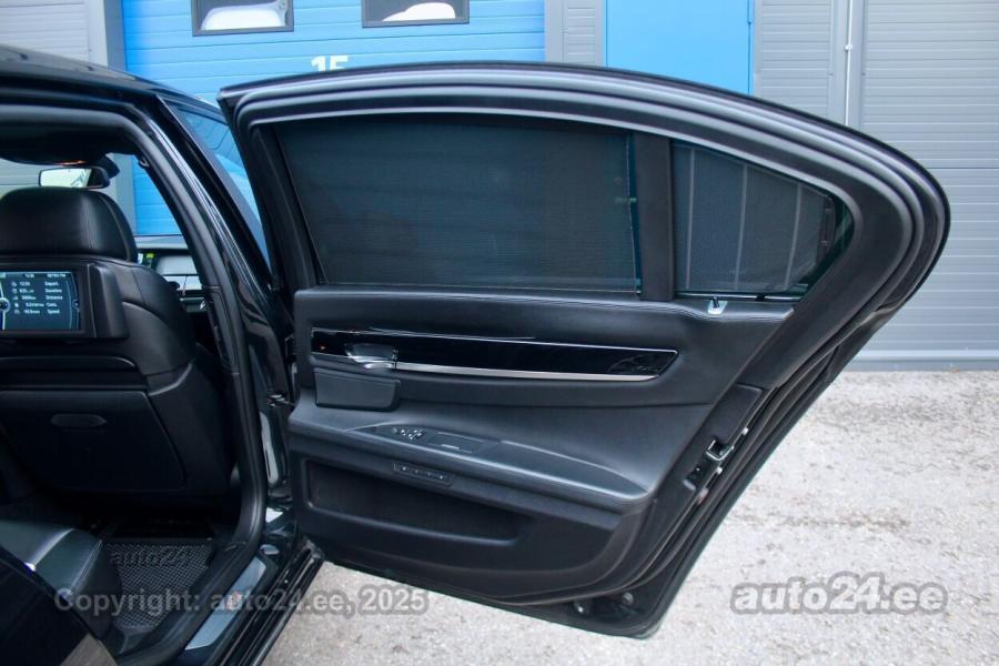 Black BMW 7 Series 2011 in Tallinn, with an engine capacity of 3.00 L and mileage of 310 thousand km for 14999 €, photo 20 on AUTOMOTO.COM.LV