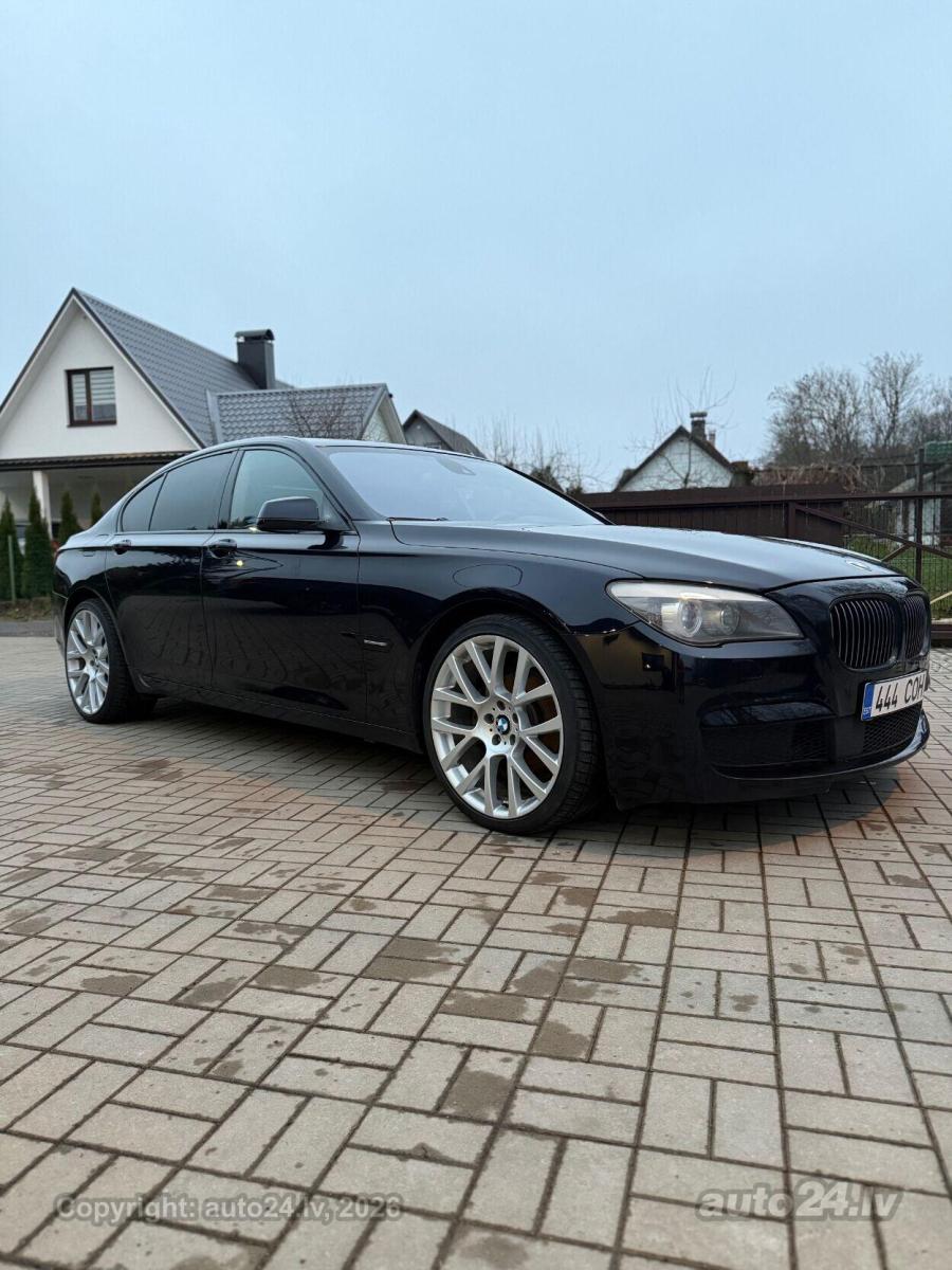 Black BMW 7 Series 2011 in Tallinn, with an engine capacity of 3.00 L and mileage of 212 thousand km for 14999 €, photo 2 on AUTOMOTO.COM.LV