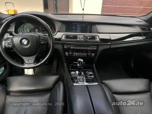 Black BMW 7 Series 2011 in Tallinn, with an engine capacity of 3.00 L and mileage of 212 thousand km for 14999 €, photo 7 on AUTOMOTO.COM.LV
