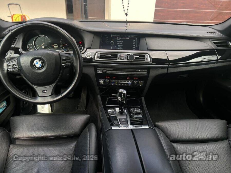 Black BMW 7 Series 2011 in Tallinn, with an engine capacity of 3.00 L and mileage of 212 thousand km for 14999 €, photo 7 on AUTOMOTO.COM.LV