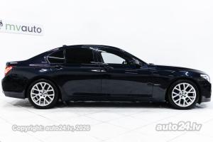 Black BMW 7 Series 2011 in Tallinn, with an engine capacity of 3.00 L and mileage of 309 thousand km for 10890 €, photo 9 on AUTOMOTO.COM.LV