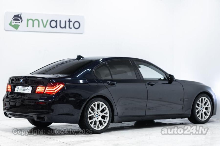 Black BMW 7 Series 2011 in Tallinn, with an engine capacity of 3.00 L and mileage of 309 thousand km for 10890 €, photo 2 on AUTOMOTO.COM.LV