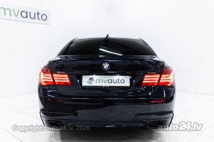 Black BMW 7 Series 2011 in Tallinn, with an engine capacity of 3.00 L and mileage of 309 thousand km for 10890 €, photo 7 on AUTOMOTO.COM.LV