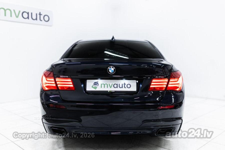 Black BMW 7 Series 2011 in Tallinn, with an engine capacity of 3.00 L and mileage of 309 thousand km for 10890 €, photo 7 on AUTOMOTO.COM.LV