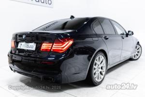 Black BMW 7 Series 2011 in Tallinn, with an engine capacity of 3.00 L and mileage of 309 thousand km for 10890 €, photo 8 on AUTOMOTO.COM.LV