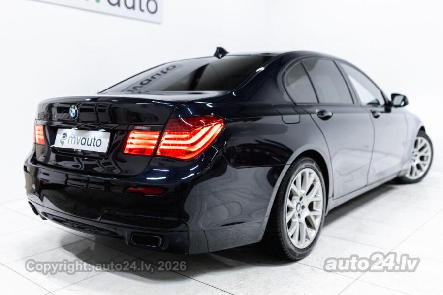 Black BMW 7 Series 2011 in Tallinn, with an engine capacity of 3.00 L and mileage of 309 thousand km for 10890 €, photo 8 on AUTOMOTO.COM.LV