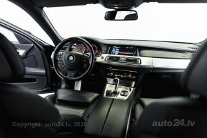 Black BMW 7 Series 2011 in Tallinn, with an engine capacity of 3.00 L and mileage of 309 thousand km for 10890 €, photo 14 on AUTOMOTO.COM.LV