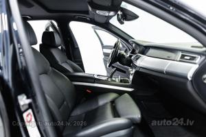 Black BMW 7 Series 2011 in Tallinn, with an engine capacity of 3.00 L and mileage of 309 thousand km for 10890 €, photo 15 on AUTOMOTO.COM.LV
