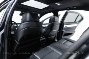 Black BMW 7 Series 2011 in Tallinn, with an engine capacity of 3.00 L and mileage of 309 thousand km for 10890 €, photo 18 on AUTOMOTO.COM.LV