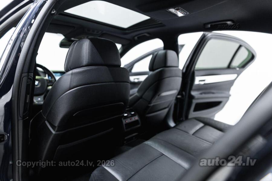 Black BMW 7 Series 2011 in Tallinn, with an engine capacity of 3.00 L and mileage of 309 thousand km for 10890 €, photo 18 on AUTOMOTO.COM.LV