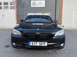 Black BMW 7 Series 2011 in Kuressaare, with an engine capacity of 3.00 L and mileage of 317 thousand km for 12999 €, photo  on AUTOMOTO.COM.LV