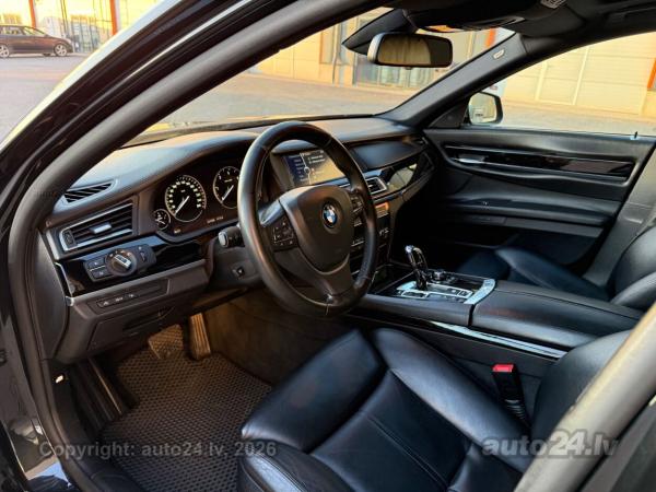 Black BMW 7 Series 2011 in Kuressaare, with an engine capacity of 3.00 L and mileage of 317 thousand km for 12999 €, photo 11 on AUTOMOTO.COM.LV
