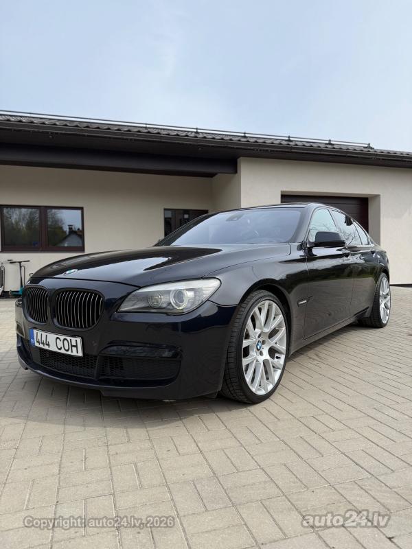Black BMW 7 Series 2011 in Tallinn, with an engine capacity of 3.00 L and mileage of 220 thousand km for 13999 €, photo 1 on AUTOMOTO.COM.LV