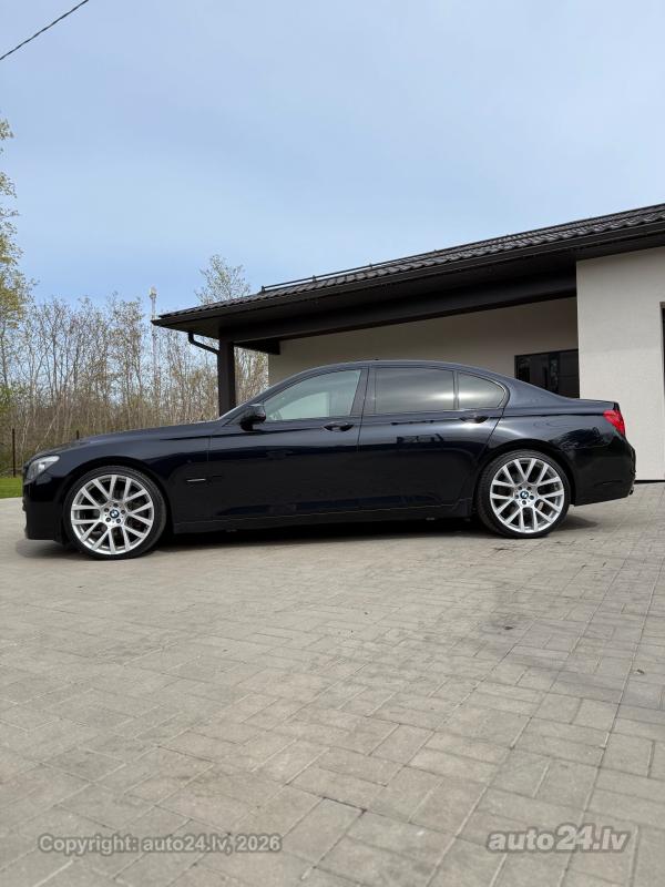 Black BMW 7 Series 2011 in Tallinn, with an engine capacity of 3.00 L and mileage of 220 thousand km for 13999 €, photo 3 on AUTOMOTO.COM.LV