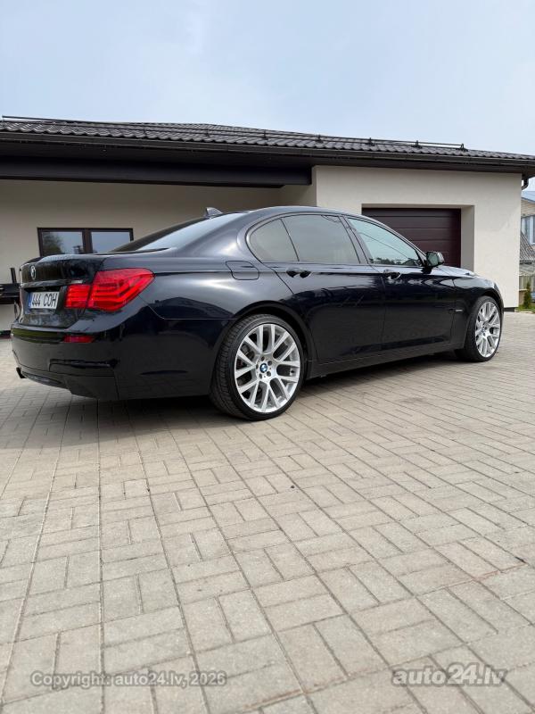 Black BMW 7 Series 2011 in Tallinn, with an engine capacity of 3.00 L and mileage of 220 thousand km for 13999 €, photo 4 on AUTOMOTO.COM.LV