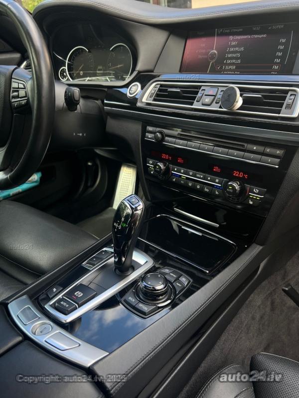 Black BMW 7 Series 2011 in Tallinn, with an engine capacity of 3.00 L and mileage of 220 thousand km for 13999 €, photo 10 on AUTOMOTO.COM.LV