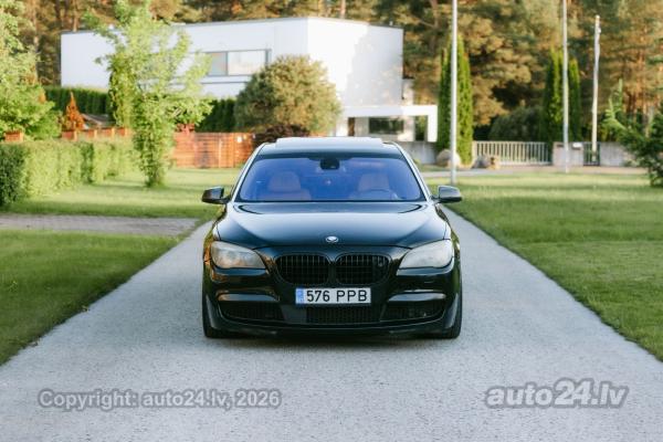 Black BMW 7 Series 2011 in Tallinn, with an engine capacity of 3.00 L and mileage of 296 thousand km for 13750 €, photo 1 on AUTOMOTO.COM.LV