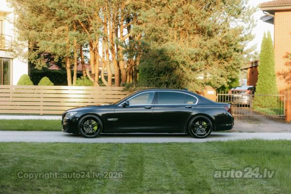 Black BMW 7 Series 2011 in Tallinn, with an engine capacity of 3.00 L and mileage of 296 thousand km for 13750 €, photo 4 on AUTOMOTO.COM.LV
