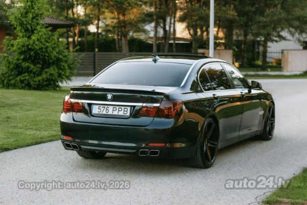Black BMW 7 Series 2011 in Tallinn, with an engine capacity of 3.00 L and mileage of 296 thousand km for 13750 €, photo 9 on AUTOMOTO.COM.LV