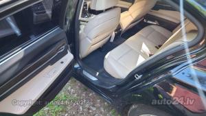 Black BMW 7 Series 2011 in Tallinn, with an engine capacity of 3.00 L and mileage of 240 thousand km for 9000 €, photo 11 on AUTOMOTO.COM.LV