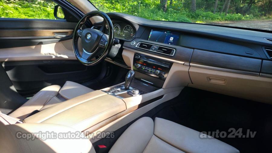 Black BMW 7 Series 2011 in Tallinn, with an engine capacity of 3.00 L and mileage of 240 thousand km for 9000 €, photo 21 on AUTOMOTO.COM.LV