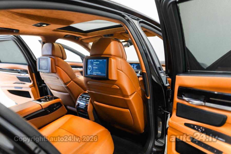 Черный БМВ 7 Серия 2011 в Таллин, объемом двигателя 3.00 л и пробегом 220 тыс. км за 12990 €, фото 18 на AUTOMOTO.COM.LV