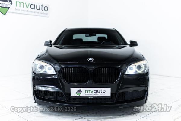 Black BMW 7 Series 2011 in Tallinn, with an engine capacity of 3.00 L and mileage of 266 thousand km for 11990 €, photo 4 on AUTOMOTO.COM.LV