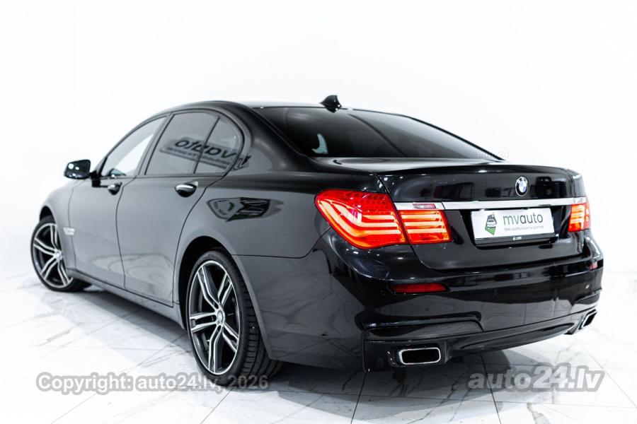 Melns BMW 7 Series 2011 Tallina, ar dzinēja tilpumu 3.00 L un nobraukumu 266 tūkst. km par 11990 €, foto 7 vietnē AUTOMOTO.COM.LV