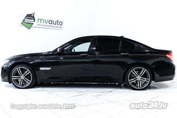 Black BMW 7 Series 2011 in Tallinn, with an engine capacity of 3.00 L and mileage of 266 thousand km for 11990 €, photo 9 on AUTOMOTO.COM.LV