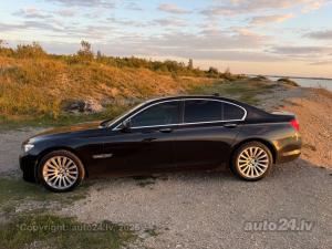 Black BMW 7 Series 2011 in Tallinn, with an engine capacity of 3.00 L and mileage of 293 thousand km for 11850 €, photo 7 on AUTOMOTO.COM.LV